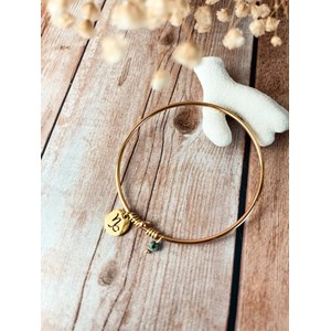 Bracelet doré signe astrologique capricorne